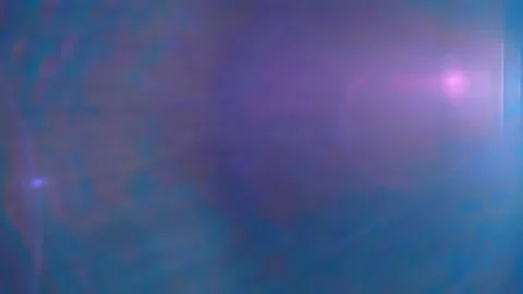 Colorful flares in lens from a bright li... | Stock Video | Pond5