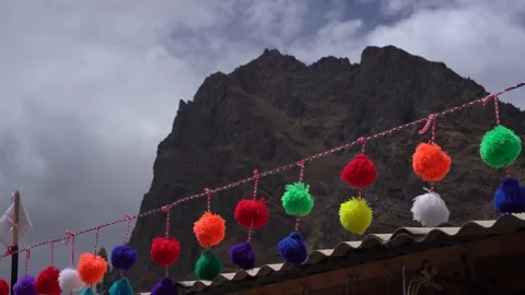 Colorful Inca Crafts Hanging Against Roc... | Stock Video | Pond5