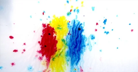 Colorful ink bleeding and absorbing into... | Stock Video | Pond5