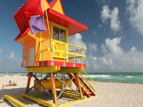 Colorful life guard observation post on ... | Stock Video | Pond5