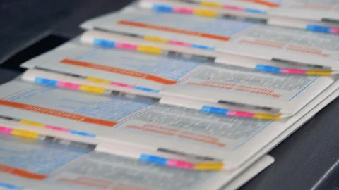 Colorful newspaper on a line, close up. ... | Stock Video | Pond5