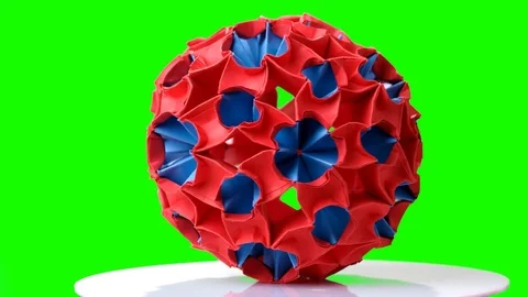 Colorful origami ball on green screen. | Stock Video | Pond5