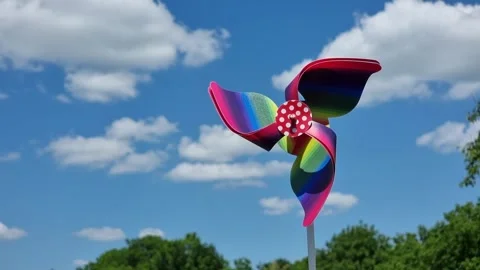 Colorful pinwheel on the background of b... | Stock Video | Pond5