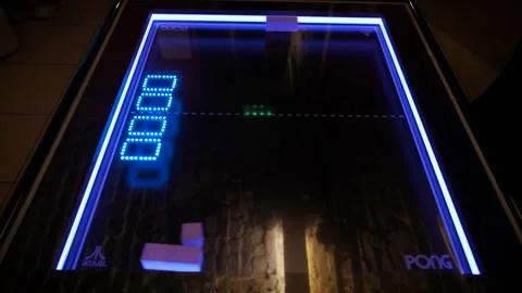 Colorful Pong game table in arcade machi... | Stock Video | Pond5