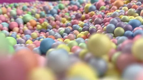 Colorful rainbow foam balls balloon. Pil... | Stock Video | Pond5