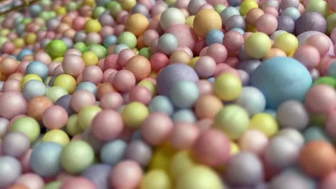 Colorful rainbow foam balls balloon. Pil... | Stock Video | Pond5