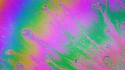 Colorful rainbow particles in chemical r... | Stock Video | Pond5