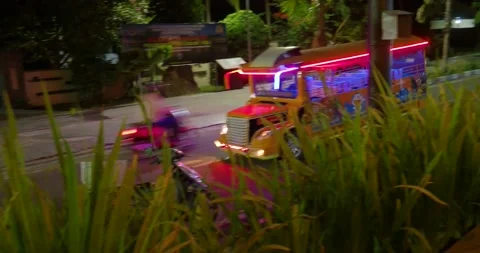 Colorful tourist shuttle bus with blue l... | Stock Video | Pond5