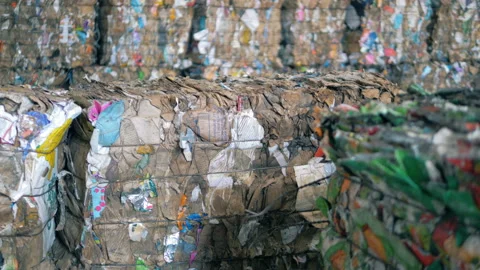 Colorful waste paper at a processing pla... | Stock Video | Pond5
