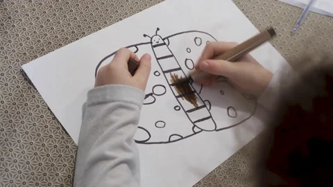 Coloring in. Child with marker drawing b... | Stock Video | Pond5