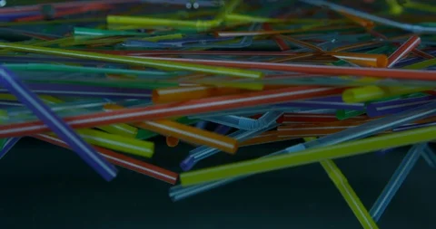 Colourful Plastic Straws Floating Around... | Stock Video | Pond5