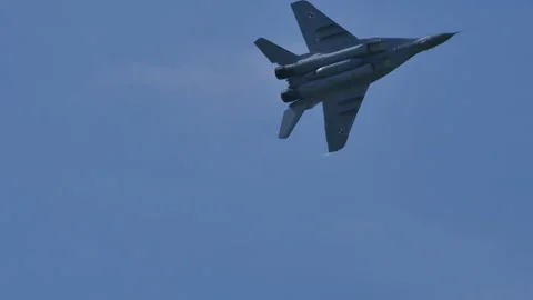 Combat fighter jet plane fly over after ... | Stock Video | Pond5