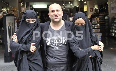 Comedian And Actor Omid Djalili Together With Burka Clad Dancers ...