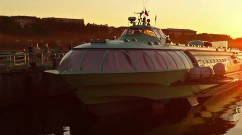 Comet hydrofoil vessel in dock at sunset... | Stock Video | Pond5