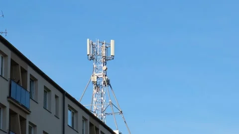 Commercial Building Rooftop Cell Tower. ... | Stock Video | Pond5