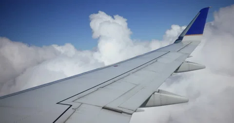 Commercial Flight Wing Flying Through Cl... | Stock Video | Pond5