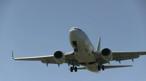 Commercial jet flying overhead | Stock Video | Pond5