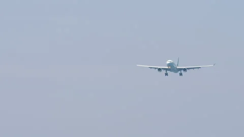 Commercial plane approach, front view | Stock Video | Pond5