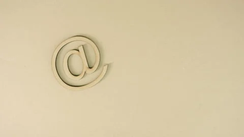 Commercial at symbol made of cardboard o... | Stock Video | Pond5