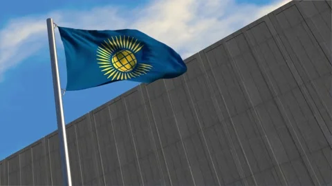 Commonwealth flag waving with a wall in ... | Stock Video | Pond5