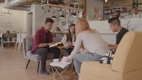 Community Group Gathering in a Coffee Sh... | Stock Video | Pond5
