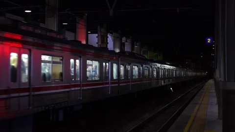 Commuter trains pass around the city of ... | Stock Video | Pond5