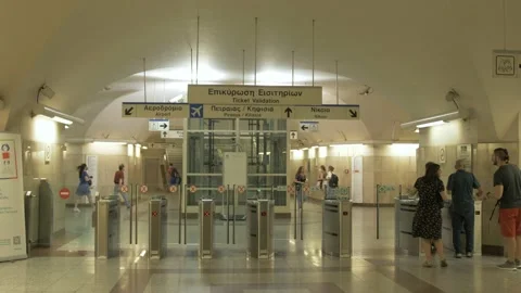 Commuters pass through barriers at the A... | Stock Video | Pond5