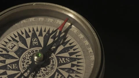 Compass with a rotating arrow close up o... | Stock Video | Pond5