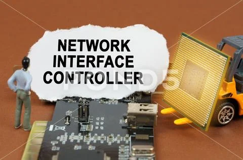 Photograph: Computer concept. On the board with microcircuits lies a ...