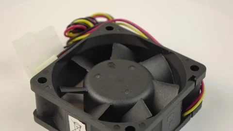 Computer fan on rotating background. | Stock Video | Pond5