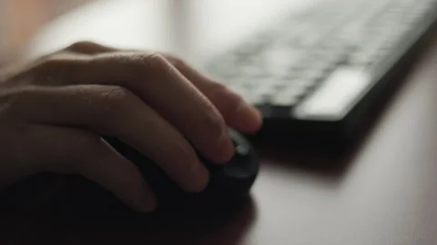 Computer mouse in hand, finger click on ... | Stock Video | Pond5