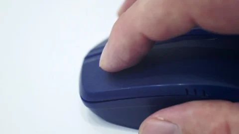 computer mouse in hand on a light surfac... | Stock Video | Pond5
