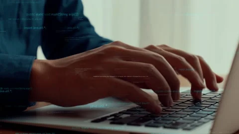 Computer programmer uses capable laptop ... | Stock Video | Pond5