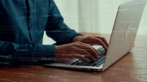 Computer programmer uses capable laptop ... | Stock Video | Pond5