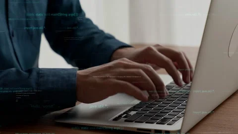 Computer programmer uses capable laptop ... | Stock Video | Pond5