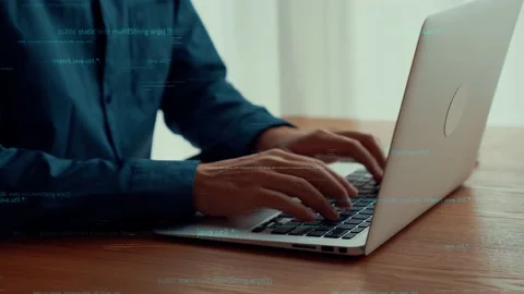 Computer programmer uses capable laptop ... | Stock Video | Pond5