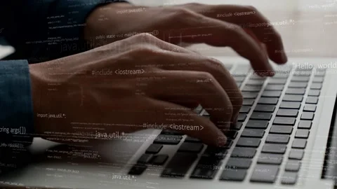 Computer programmer uses capable laptop ... | Stock Video | Pond5