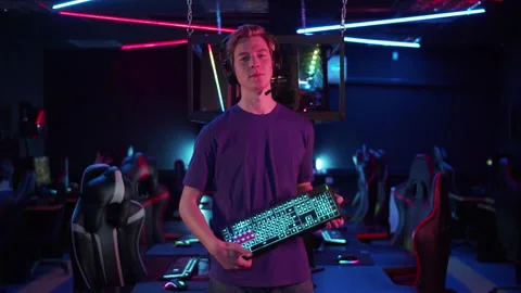 In the computer room, a cool gamer in a ... | Stock Video | Pond5