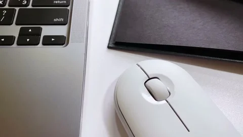 Computer white mouse in hand with notepa... | Stock Video | Pond5