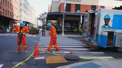 Con Edison emergency workers measure the... | Stock Video | Pond5