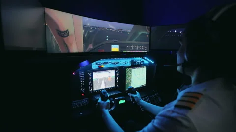 Concentrated female pilot sitting in cab... | Stock Video | Pond5