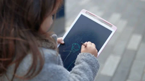 Concentrated little girl drawing stick f... | Stock Video | Pond5