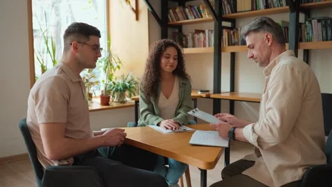 Concentrated teacher interviewing multin... | Stock Video | Pond5