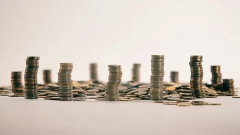 The concept of money. Columns of gold co... | Stock Video | Pond5