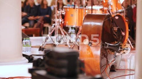 A concert in the concert hall. A drum kit and sound equipment ~ Hi Res ...