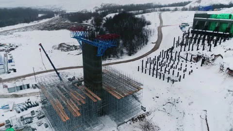 Concrete column with carcass and scaffol... | Stock Video | Pond5