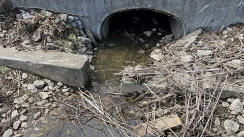 Concrete drainage ditch and pipe with fl... | Stock Video | Pond5