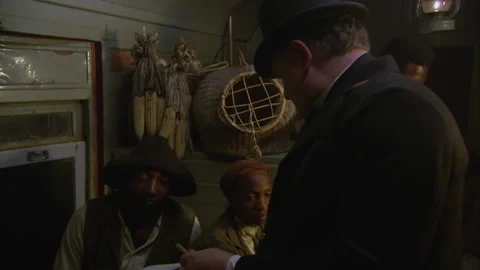 Conductor checking paperwork on train, 1... | Stock Video | Pond5