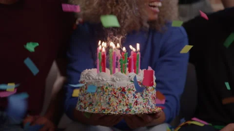 Confetti Falling Down on a Birthday Cake... | Stock Video | Pond5