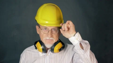 Confidence worker wearing a safety helme... | Stock Video | Pond5